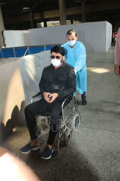 Wheelchair Bound Kapil Sharma Snapped At The Airport Fans Express