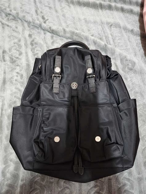 我要賣 ️已售出 降價囉！！tory Burch 尼龍翻蓋後背包 〔黑色〕 二手交易板 Dcard