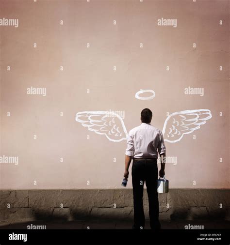 Homme Avec Des Ailes Dange Banque De Photographies Et Dimages à Haute