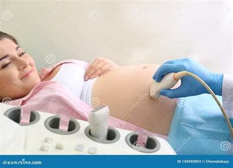 Young Pregnant Woman Undergoing Ultrasound Scan Stock Image Image Of
