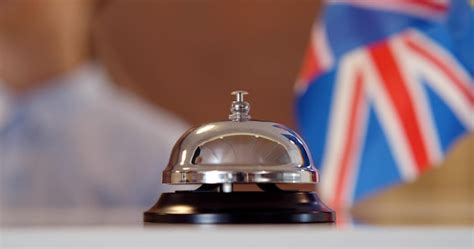 Premium Photo Cropped Shot Of Hotel Reception Service Bell To Attract