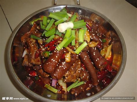 红烧猪尾巴摄影图 传统美食 餐饮美食 摄影图库 昵图网