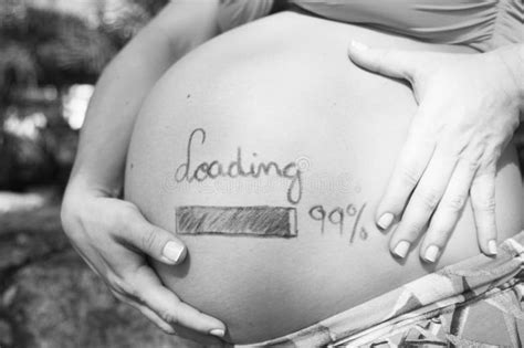Image Of A Pregnant Woman With A Huge Belly About To Give Birth Stock