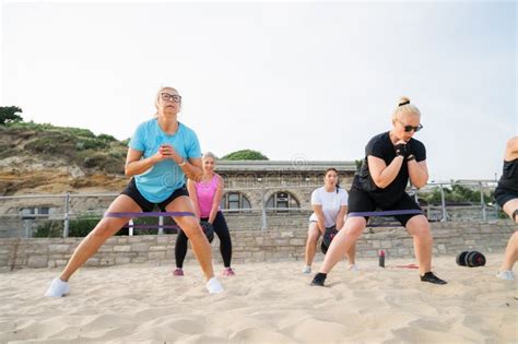 Active Women Of Various Ages Doing Fitness Workouts In Class Exercise