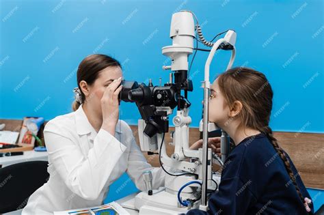 Premium Photo Pediatric Ophthalmologist With Slit Lamp Examines Eyes