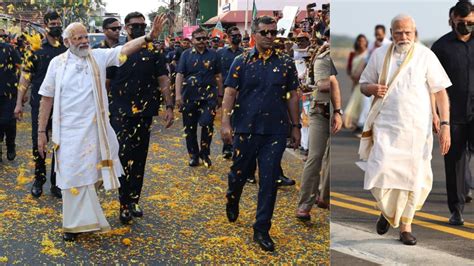 Pm Modi Dons Traditional Mundu Shawl And Kurta Holds Mega Roadshow In