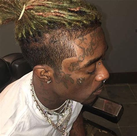 Lil Uzi Vert Debuts New Hairstyle And Brings Out Stacks Of Cash On Stage