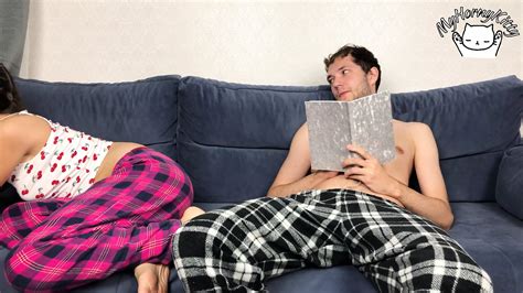 step brother secretly jerking off close to step sister but she caught him they cum at the same