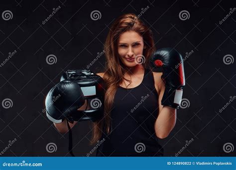 Portrait Of A Sportive Woman Dressed In Sportswear Wearing Boxing