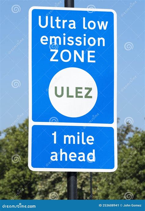 Close Up Of Ultra Low Emission Zone Sign Against A Clear Blue Sky