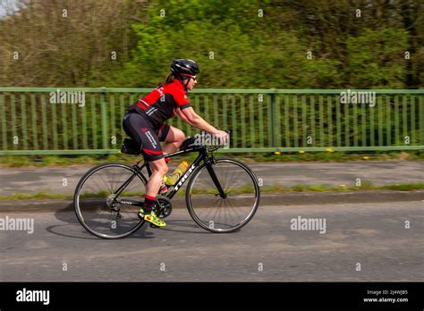 Manchester Triathlon Club Woman Member Riding Trek Emonda Bicycle With
