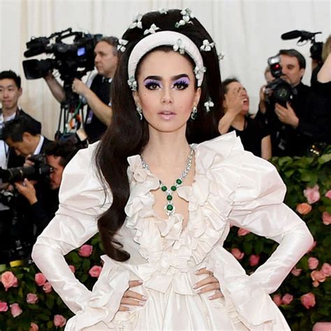 Lily Collins Tears Up As She Meets Her Idol Victoria Beckham