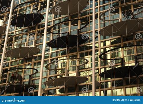 The Building S Circular Design Reflects Other Buildings And Its Reflection In The Windows Stock