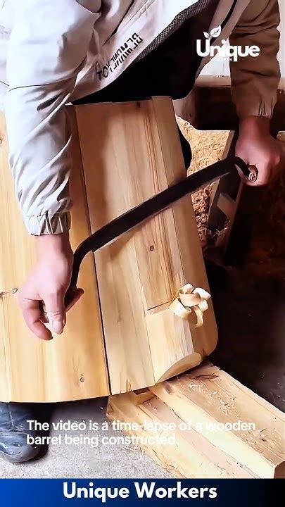 The Process Of Building A Wooden Barrel The Workers Do Their Job