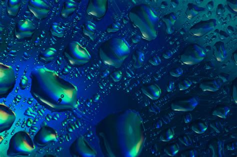 홀로그램 효과의 아름다운 추상화 팬텀 블루 녹색 빛 물 방울을 닫습니다 디자인에 대한 배경 패턴입니다 매크로 사진 보기 0명에