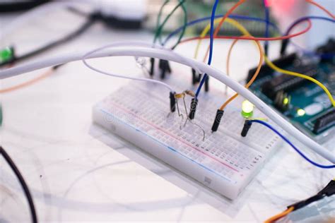 Breadboard And Microcontroller With Circuit And Light Sensor St Stock