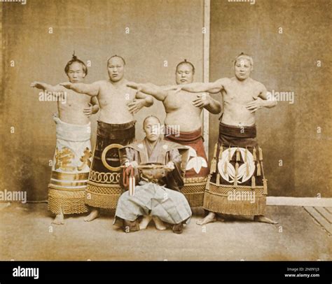 A Photograph Of Japanese Sumo Wrestlers Published In Views And Costumes