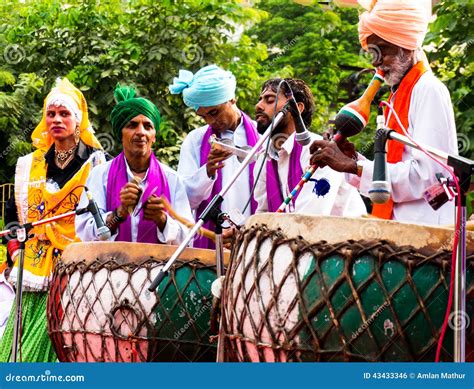 Two Indian Musicians Play Drums And Flute In A Summer Park Editorial