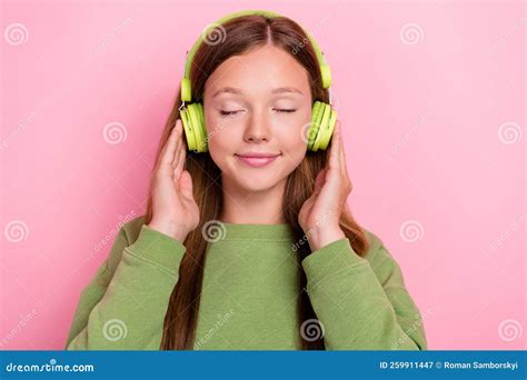 Photo Of Dreamy Sweet Schoolgirl Wear Green Sweatshirt Arms Earphones