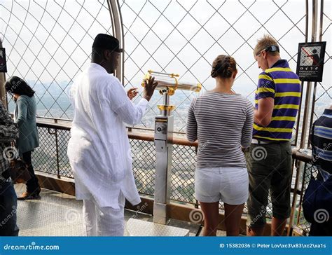 Foreign Tourists With Telescope On Eiffel Tower Editorial Photo Image