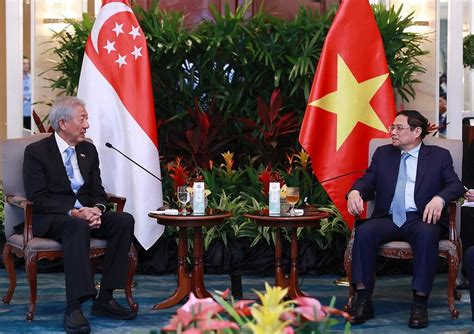 Le Premier ministre Pham Minh Chinh reçoit le ministre sénior Teo