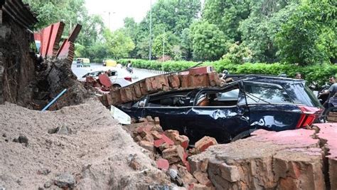 Delhi Rains Cause Traffic Chaos On Waterlogged Roads Vehicles Damaged