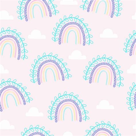 Un patrón sin fisuras con arco iris y nubes Vector Premium