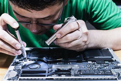 Man Fixing Laptop Computer Stock Image Image Of Electrical 232085859
