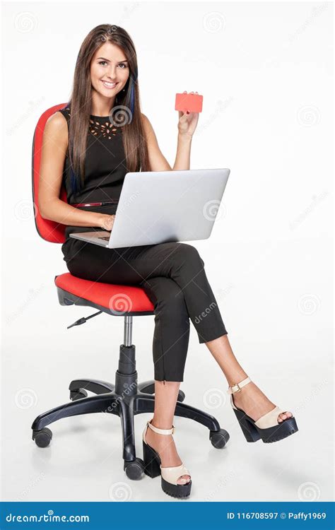 Business Woman Sitting On Office Chair Working With Laptop Stock Image