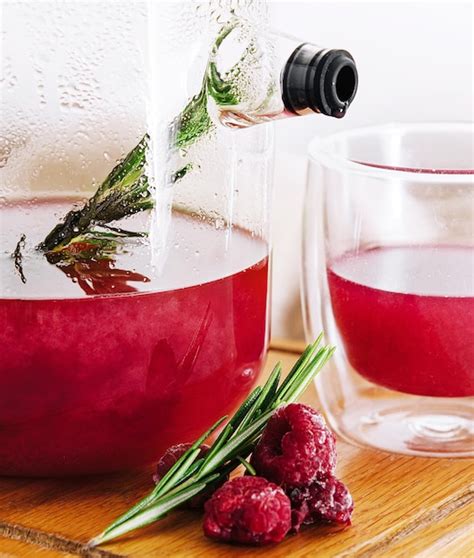 Premium Photo Fruit Raspberry Tea In Glass Teapot And Cup