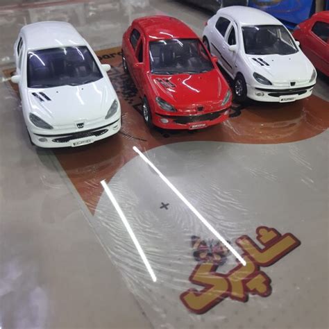 خرید و قیمت ماشین ماکت فلزی 206 موزیکال سه حالته چراغدار سایز بزرگ از غرفه دنیای اسباب بازی شاپرک