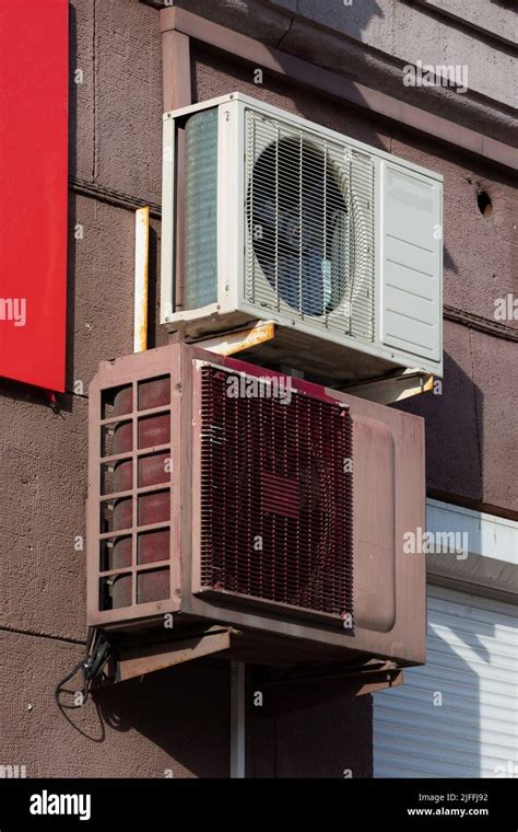 Air Conditioning Unit Central Split System Hanging Outside The Building