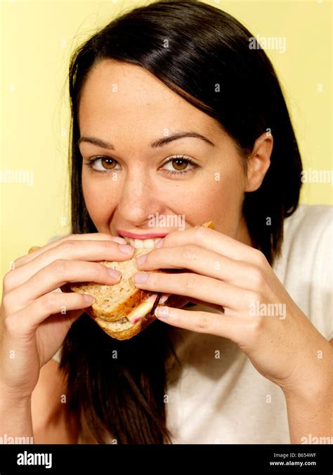 Woman Eating Sandwich Model Released Banque De Photographies Et D