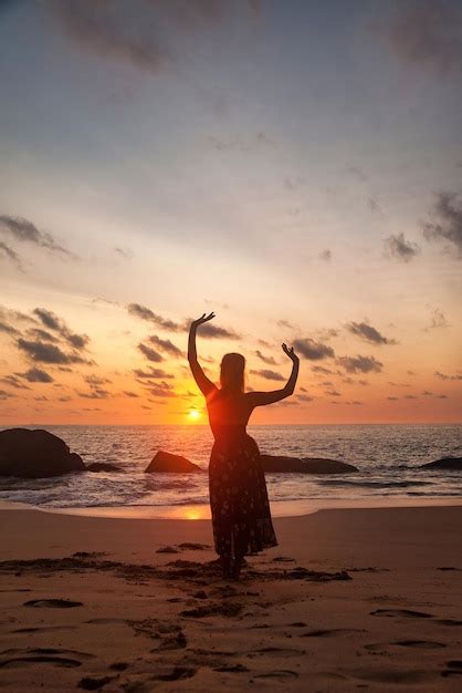 Premium Photo Silhouette Rear View Pretty Woman With Arms Raised