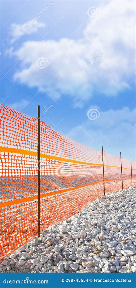 Construction Site With Safety Orange Plastic Grid On A Workplace Stock