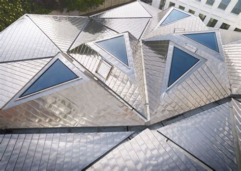 Triangular Skylights Set Into A Faceted Stainless Steel Roof Direct