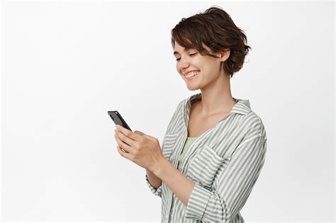 Free Photo Portrait Of Smiling Girl Chatting On Mobile Phone Using