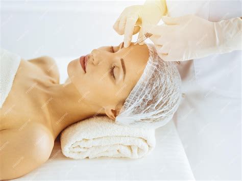 Premium Photo Beautiful Woman Receiving Beauty Injections With Closed