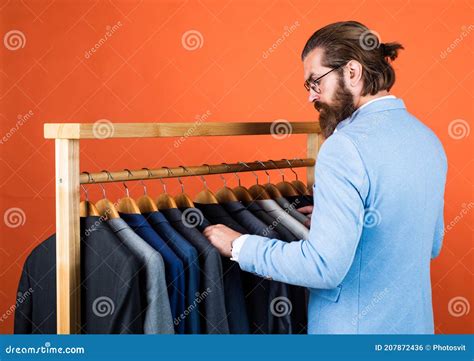 Well Groomed Man In Wedding Formalwear Has Beard Choose Jacket In