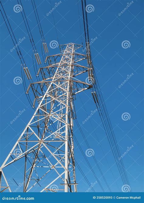 Electricity Transmission Pylon Against Blue Sky Stock Image Image Of