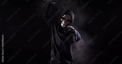 Scary Man In The Hooded Sweatshirt Wearing Halloween Mask Holding A