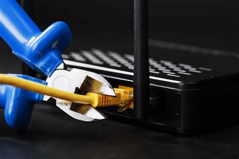 Premium Photo Cutting And Disconnecting The Network Internet