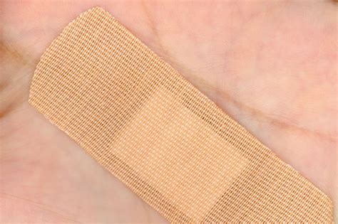 Band Aid Bandage On Hand