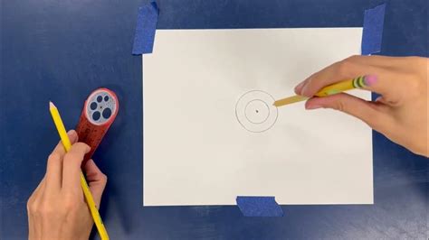 How To Draw Concentric Circles With A Plastic Compass Youtube