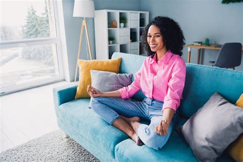 Full Size Photo Of Pretty Young Girl Sit Sofa Meditate Wear Trendy Pink