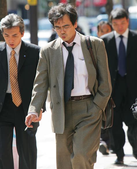 Japanese Man In Suit