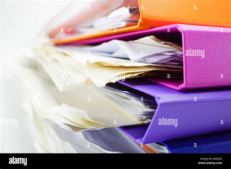 File Folder Binder Stack Of Multi Color On Table In Office Stock Photo Alamy