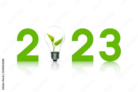 Green Energy 2023 Concept Light Bulb With Sprout Inside And 2023