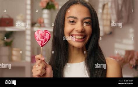 Smiling Beautiful Latina American Woman Eat Candy Lollipop Happy Cheerful Girl Hispanic Teen