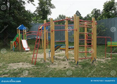 Playground With Horizontal Bars Ladders And Exercise Equipment On The